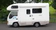 Tiny Isuzu Elf Camper RV Is a Tight World Solution to Travel