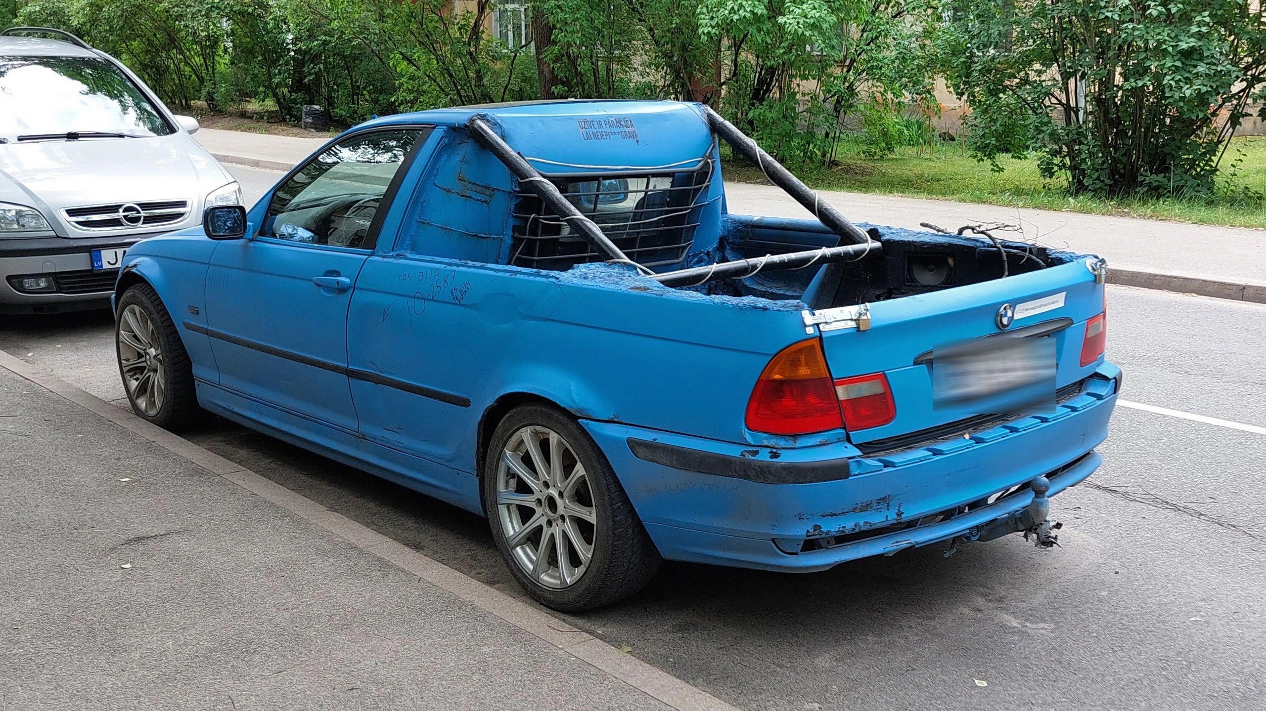 Blasphemy! Sports Cars Turned Into Pickup Trucks - MotorBiscuit