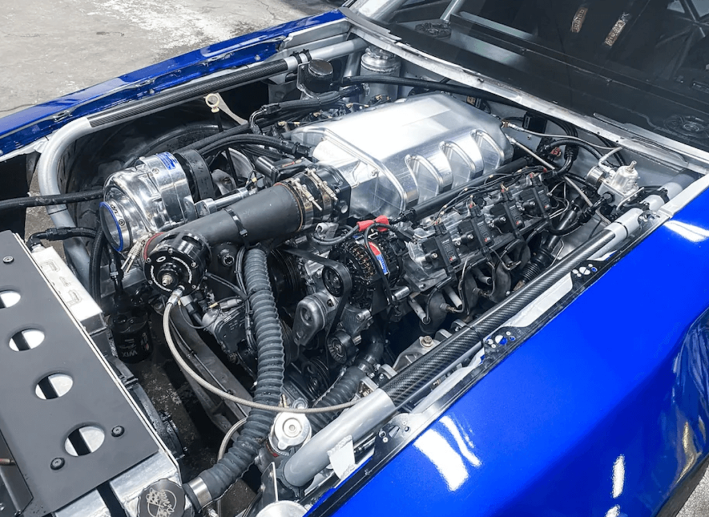 This Happens When You Stuff a 7.3 Godzilla Engine into a Fox Body Mustang