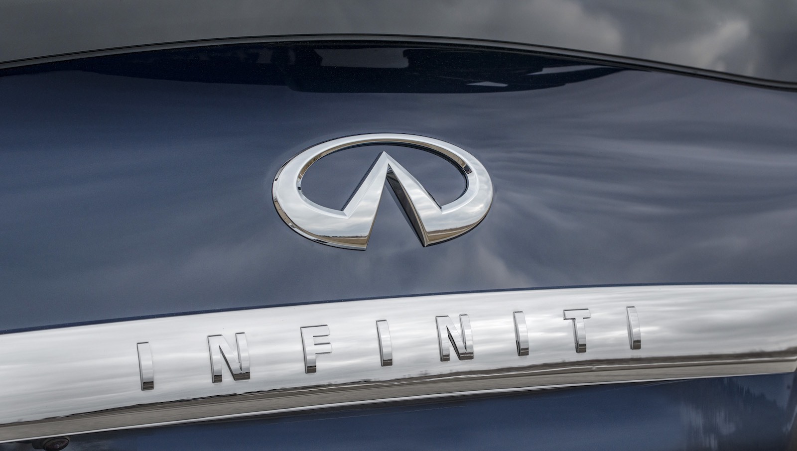 The INFINITI Brand Logo is a Road Disappearing into the Horizon