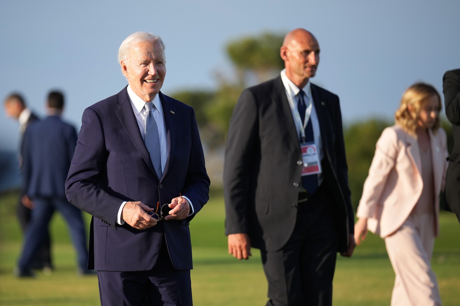 Joe Biden Struggles to Climb Into an Armored Chevy Suburban