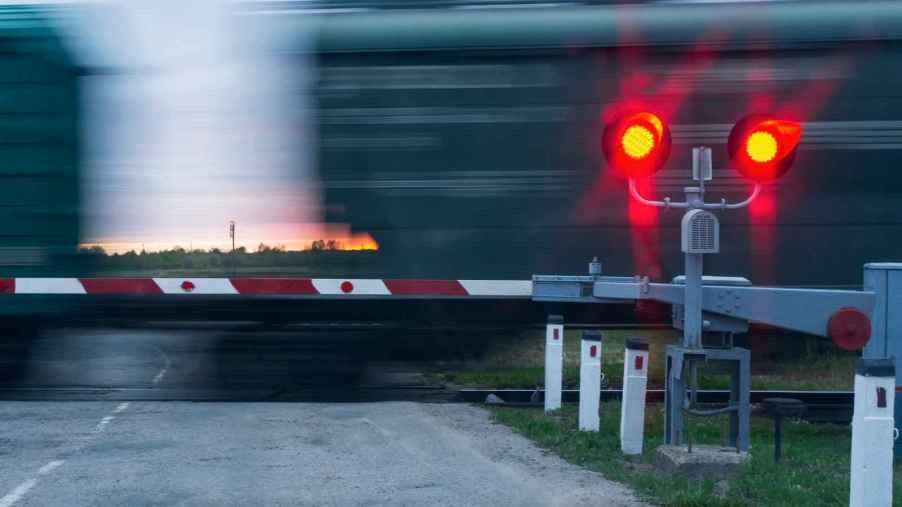 Watch Truck Driver Narrowly Escape Oncoming Train