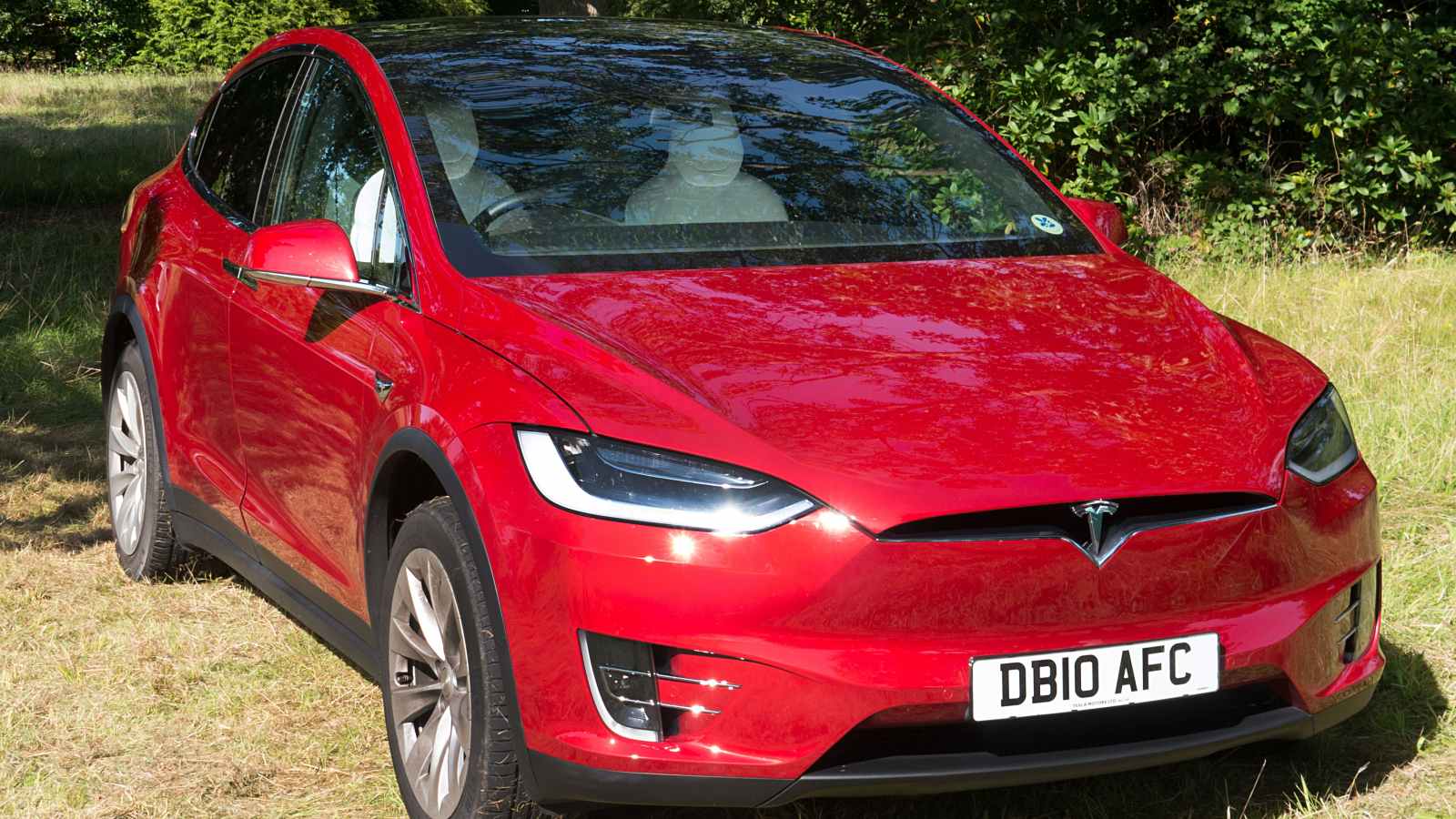 Tesla is recalling 9,000 SUVs over concerns the roof could crash ...
