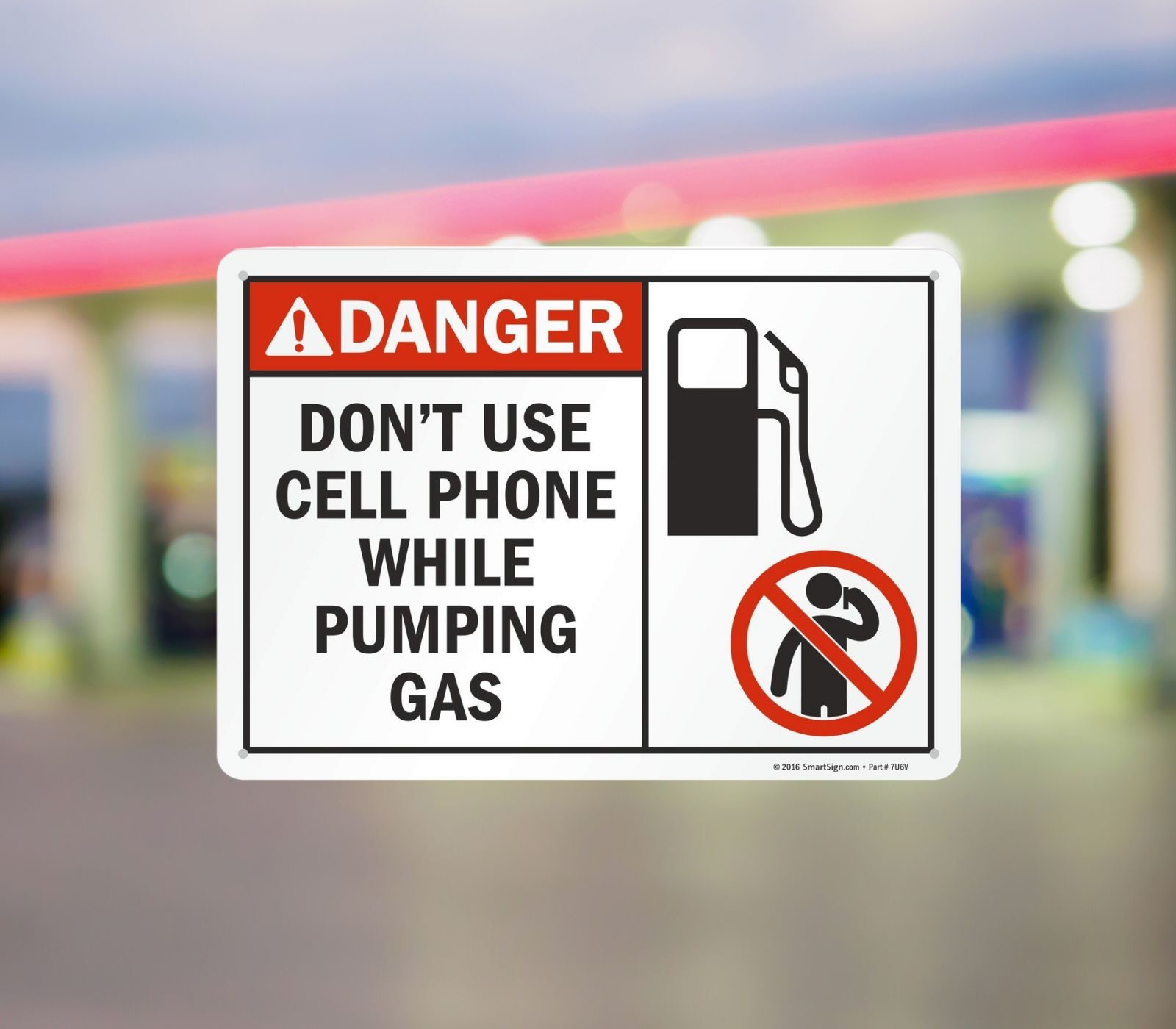 Why do gas stations have 'no cell phone' signs?