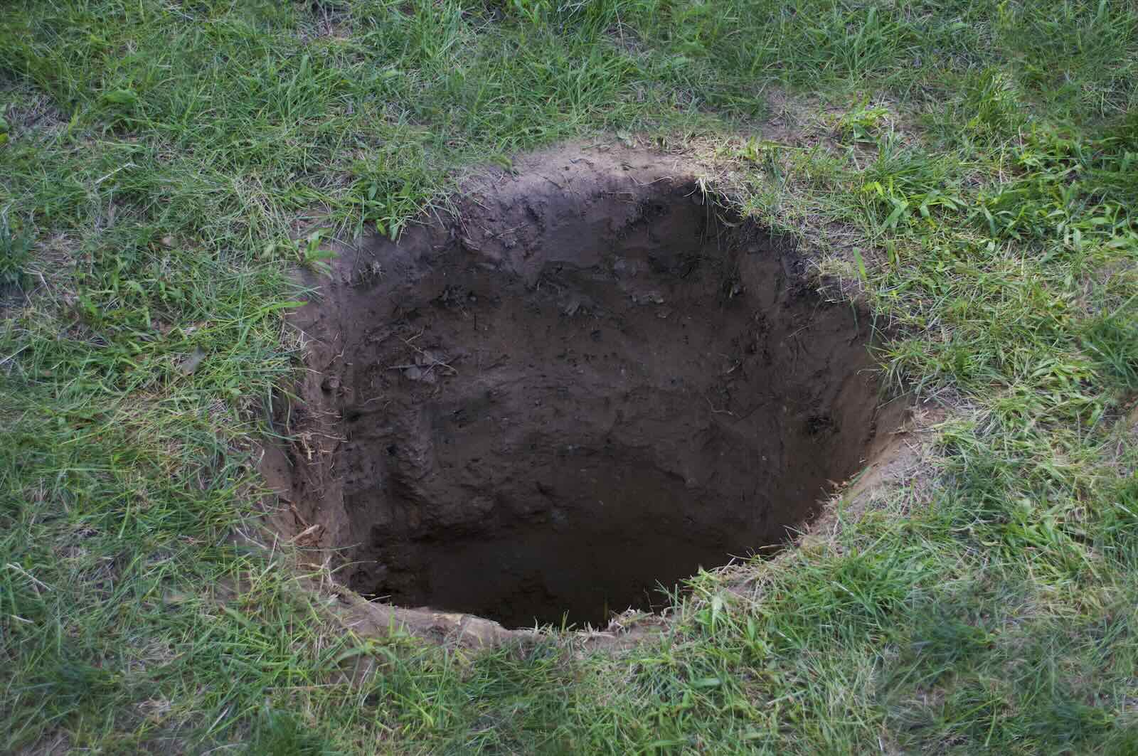 Customer falls into 8-foot hole at dealership, needs multiple surgeries