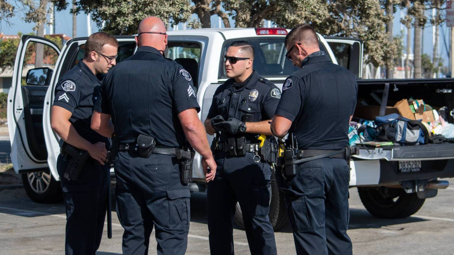 2 people are in jail after crashing into a police car while possessing ...