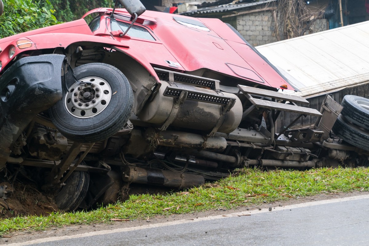 New York semi-truck driver sends police officer flying over a guardrail