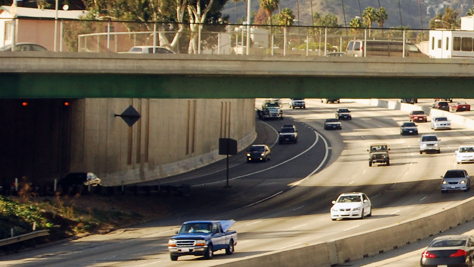 Video: Over-Height Semi Hits California Overpass Causing Crash